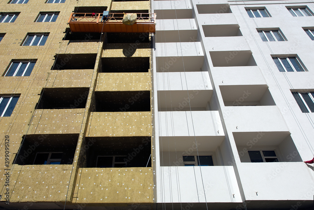 Thermal insulation of houses, construction phase. Energy saving ...