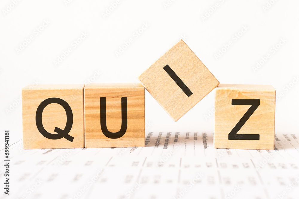 Word quiz. Wooden small cubes with letters isolated on white background ...