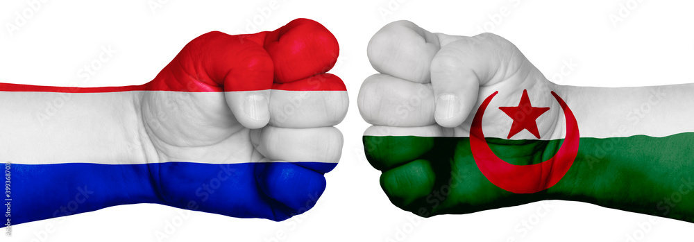 Foto de Stock Two hands are clenched into fists and are located ...