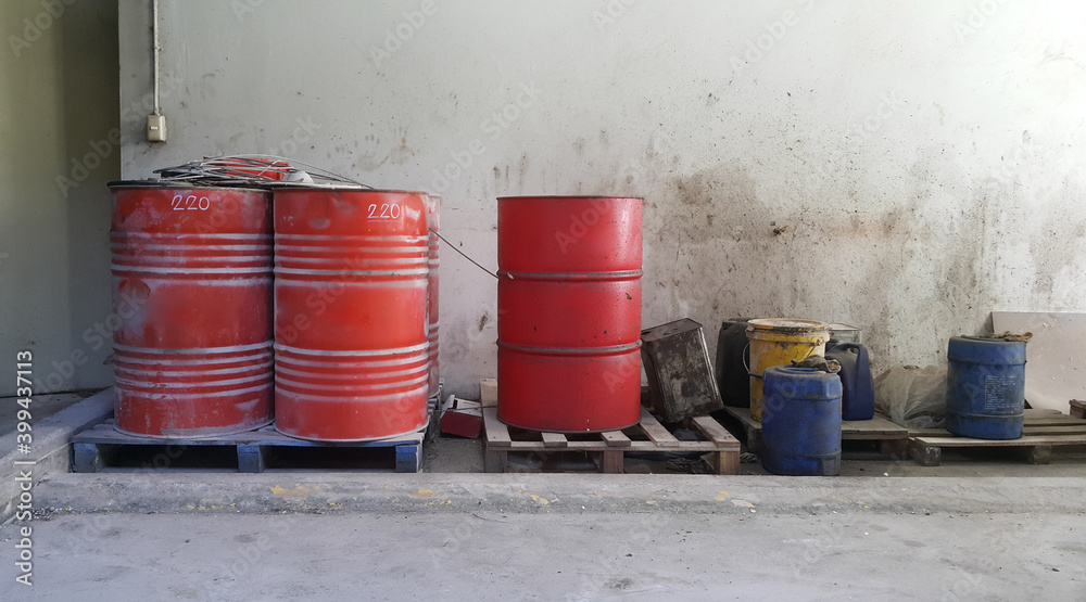 Dirty greasy barrels outside building with grease barrels.Disposed used ...