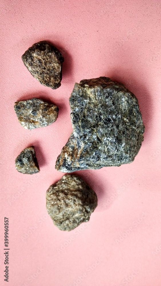 Schist Mica metamorphic rock foliated structure on pink background ...