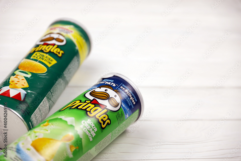 Pringles sour cream onion and cheese onion flavour. Cardboard tube cans ...
