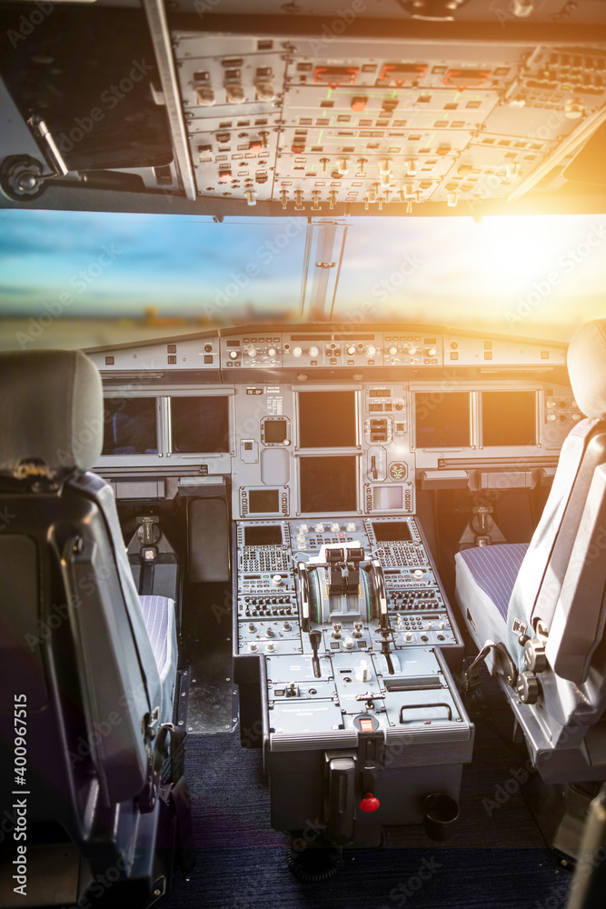 Aircraft interior, cockpit view inside the airliner. Sunny sky horizon ...