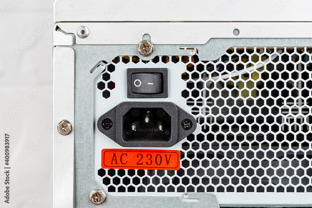 Rear view of tower computer case with new power supply unit installed ...