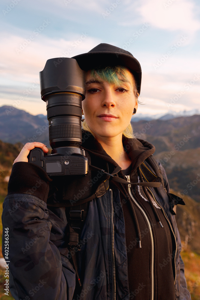 Young girl and photographer proudly poses looking at the camera with ...