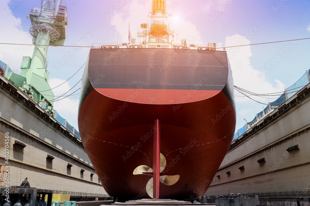 Propeller center of Stern of Big Cargo ship Moored on sleeper wood ship ...