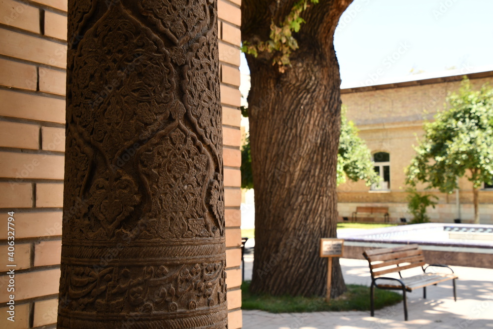 Wooden pillar and oak tree in the garden patio, Tashkent, Uzbekistan ...
