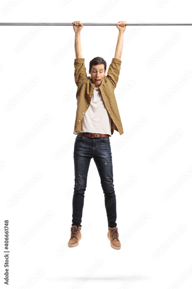 Scared man hanging and holding onto a bar Stock Photo | Adobe Stock