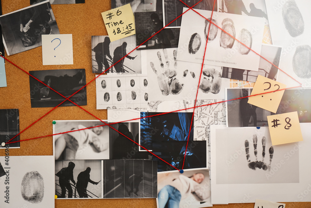 Detective board with crime scene photos, stickers, clues and red thread ...
