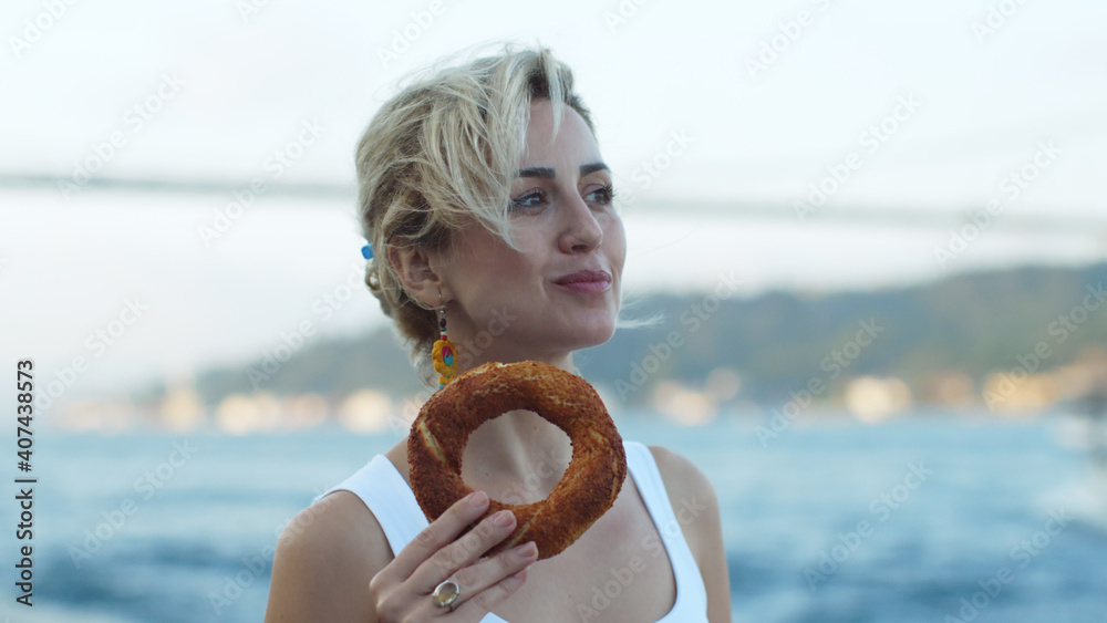 Beautiful woman traveler in the Bosphorus. A popular destination in ...