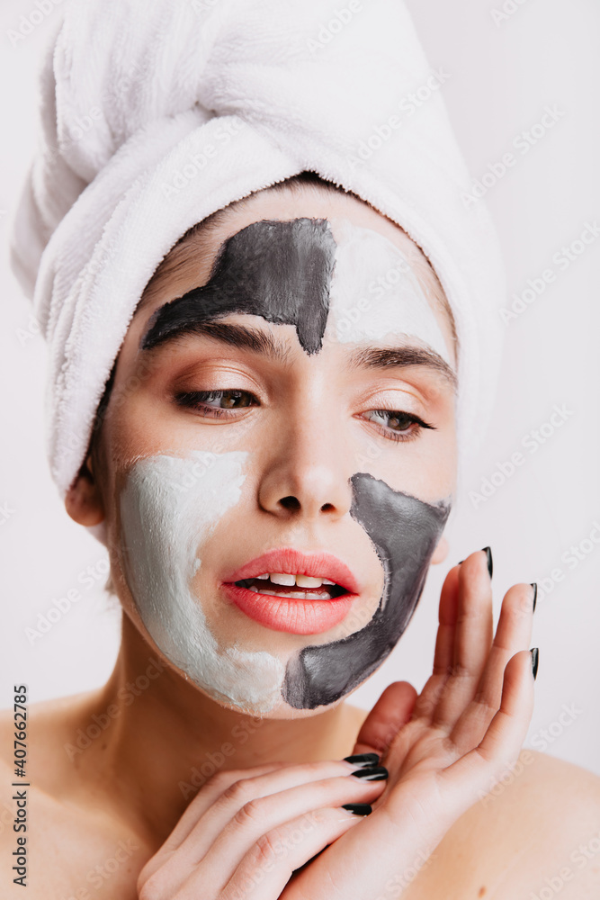 Girl without makeup does her morning routine on white background. Lady ...