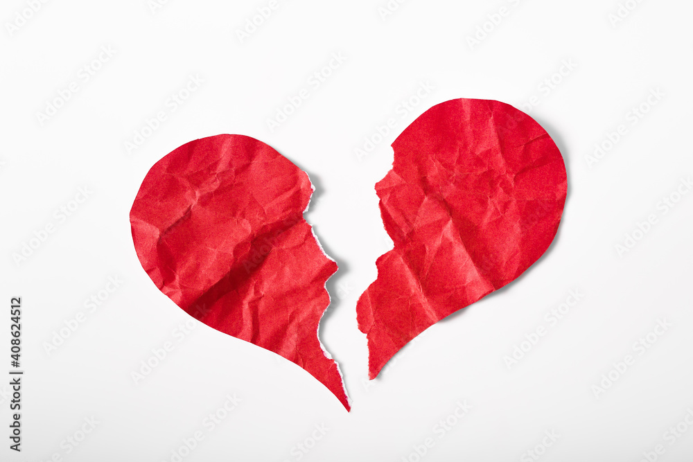 Pieces of crumpled and torn red heart shape paper isolated on white ...