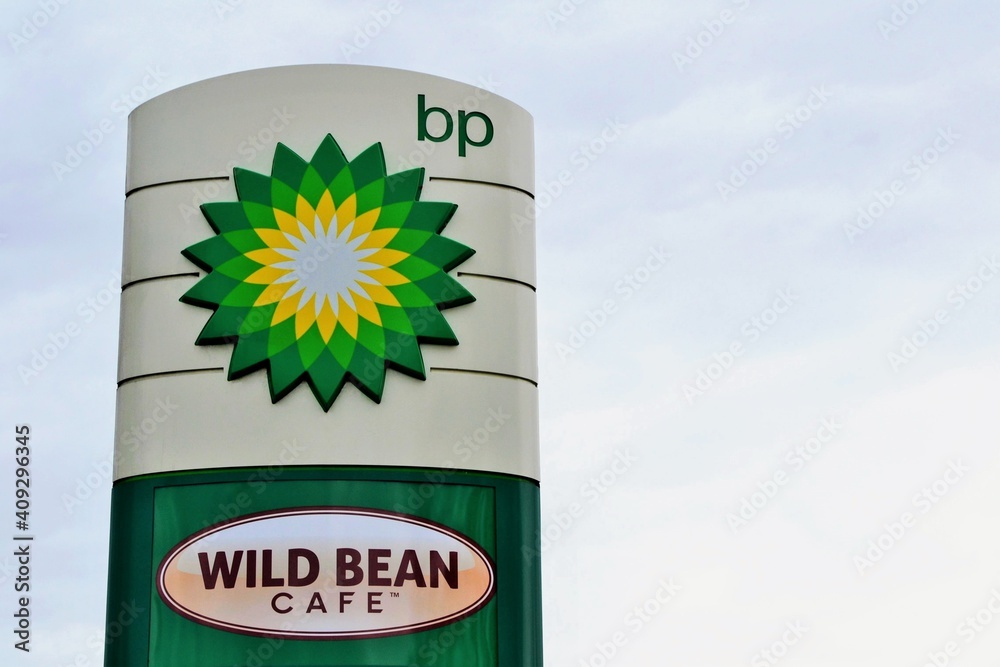 BP singboard, logo. BP and Wild Bean Cafe. BP plc (formerly The British ...