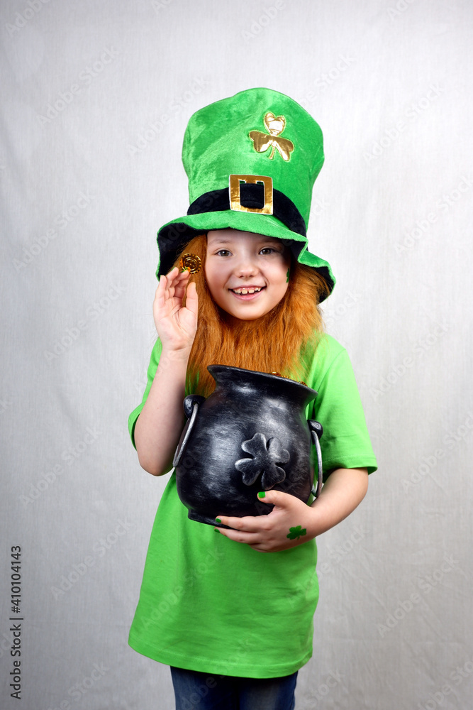 Portrait of smiling adorable girl with decorative red beard, green ...