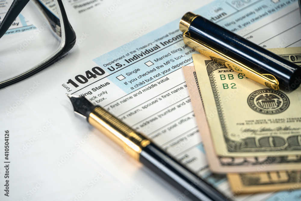 Blank Form 1040 U.S. Individual Income Tax Return with Pen and ...