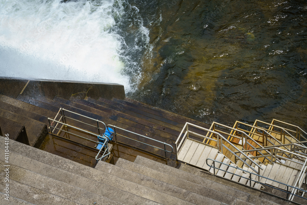 Hinze Dam spillway viewed from the top. The Hinze Dam is a rock and ...