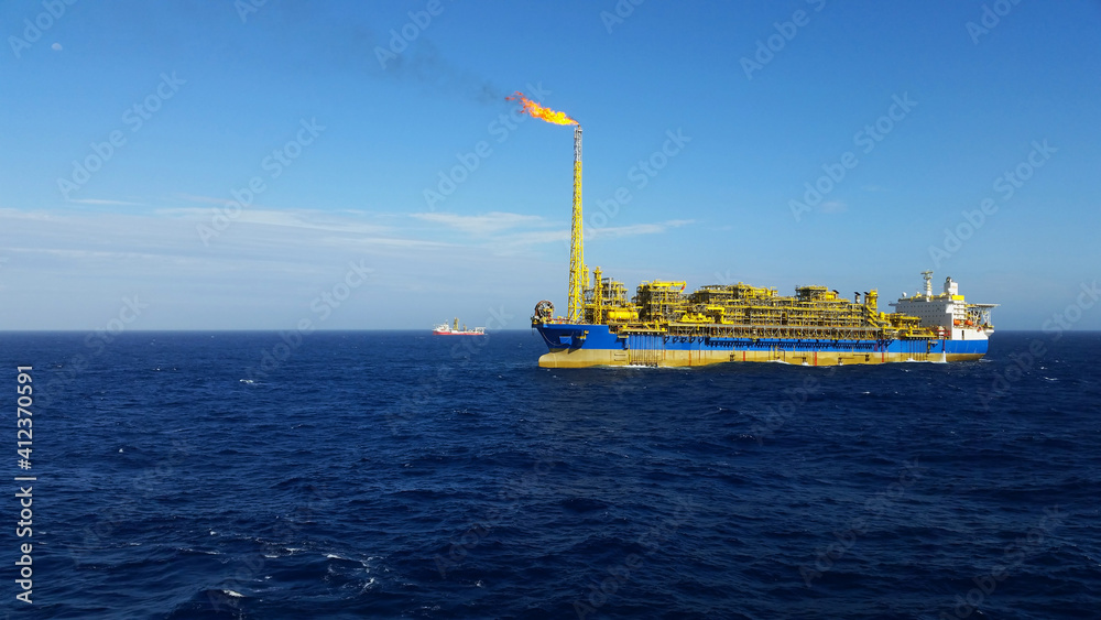 Offshore FPSO ship in production. Floating production, storage, and ...