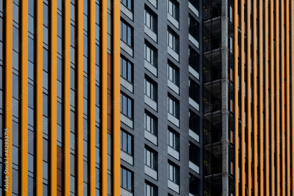 Architectural pattern from the windows and Ventilated facade of a multi ...