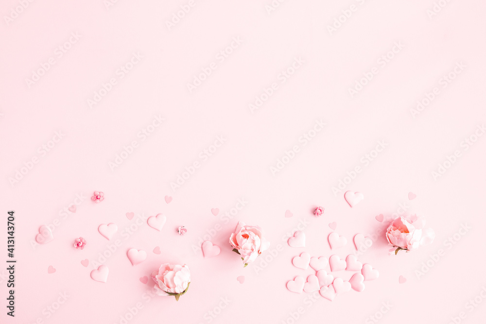 Valentine's Day background. Frame made of pink flowers, hearts on ...