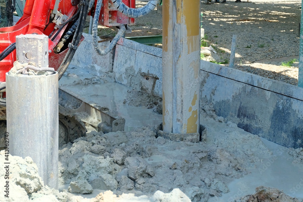 Hydraulic drilling machine is boring holes in the construction site for ...