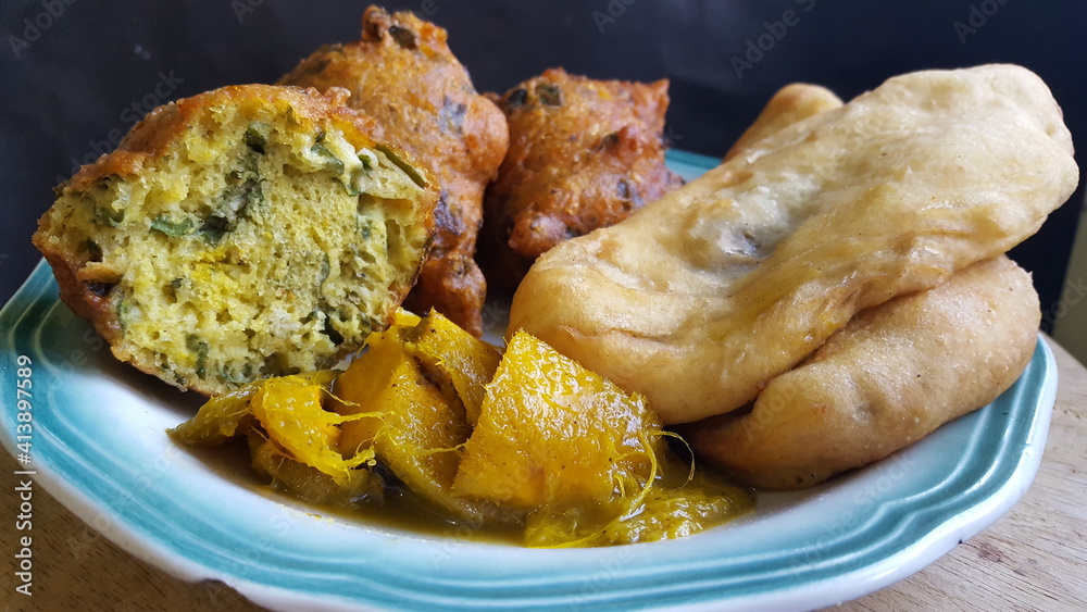 A plate of Trinidad and Tobago's Aloo or potato pies, Saheena (Sahina ...