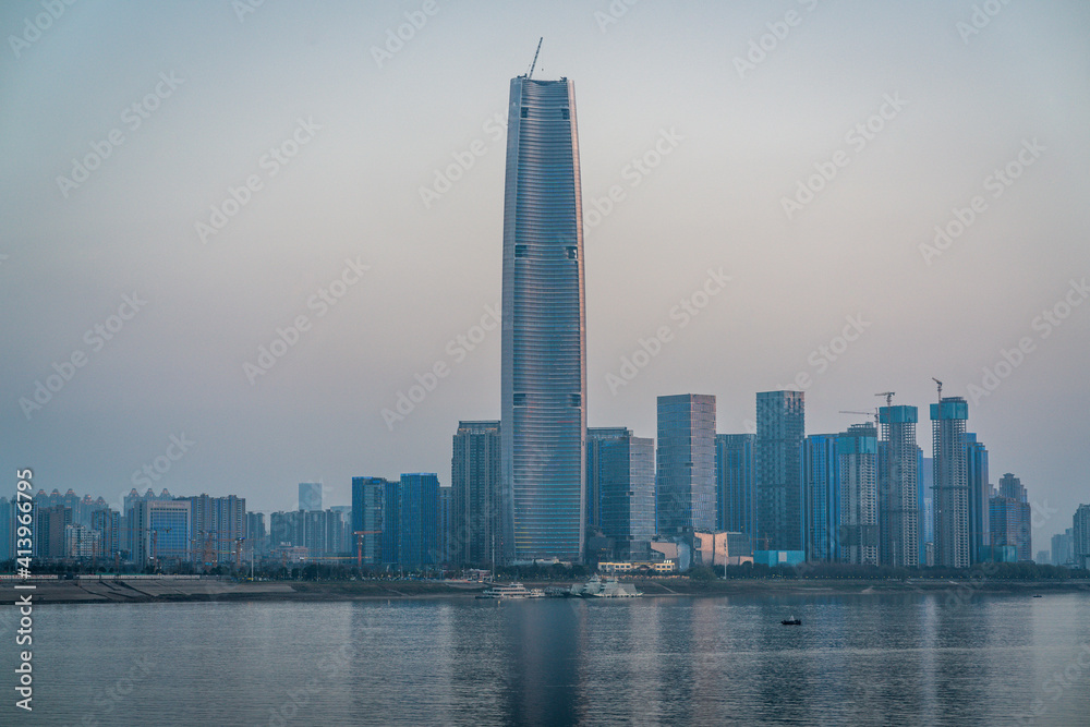 Wuhan skyline and Yangtze river with supertall skyscraper under ...
