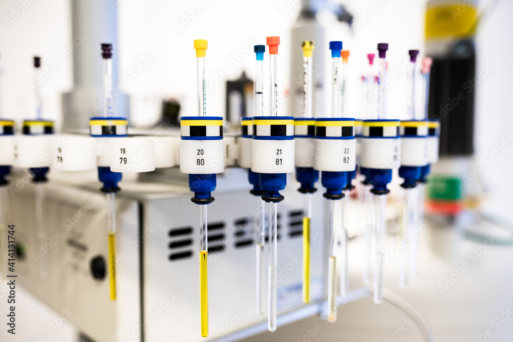 Autosampler of NMR spectrometer loaded with samples for analysis ...