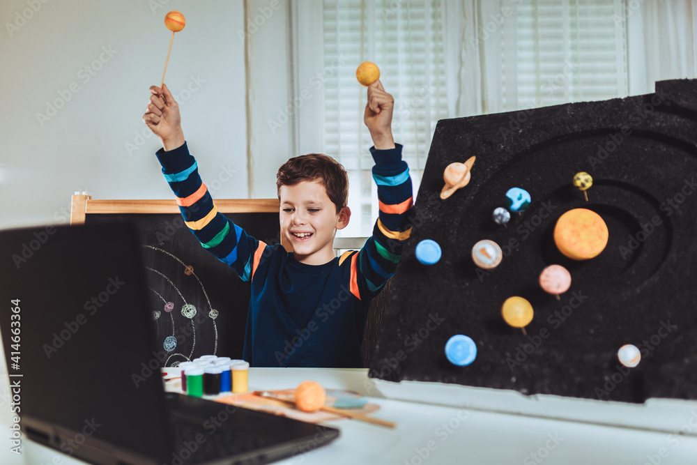 Kid presenting his science home project - the planets of our solar ...