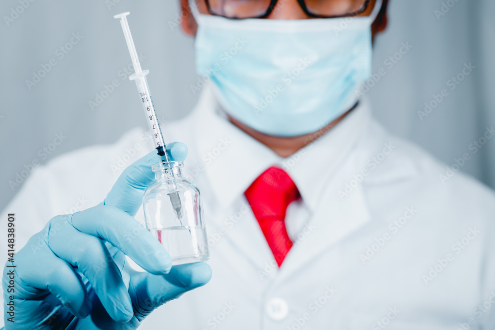 Doctor or scientist wearing antivirus clothing In the laboratory ...