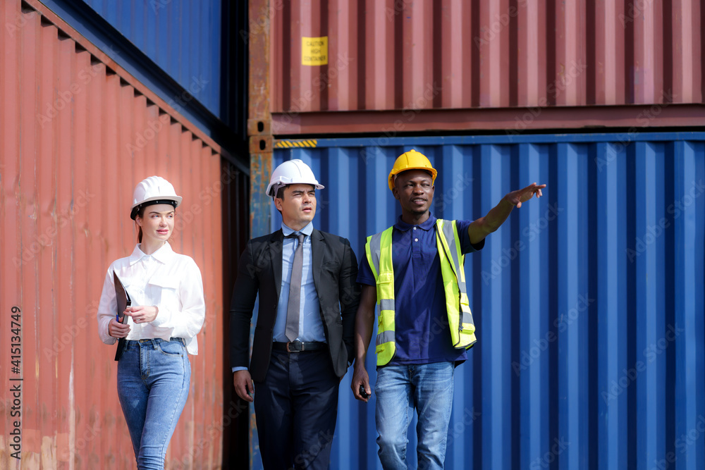 African american foreman is explaining the various sections of the ...