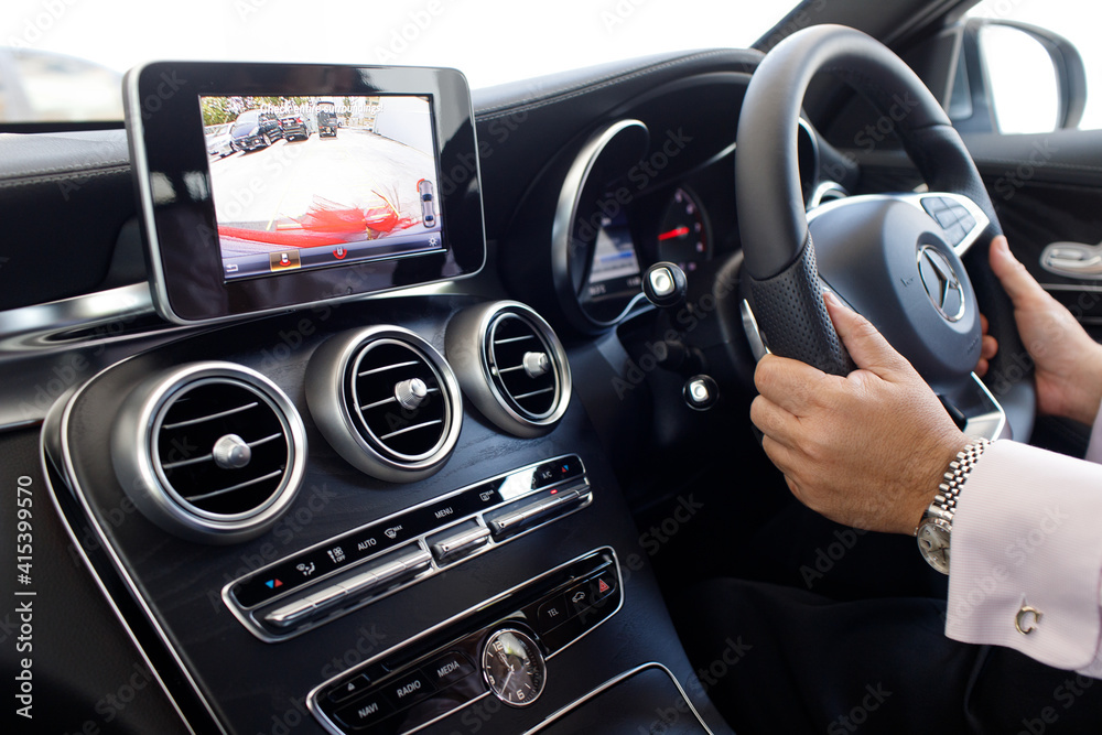 Interior view of the Mercedes Benz car. A successful businessman ...