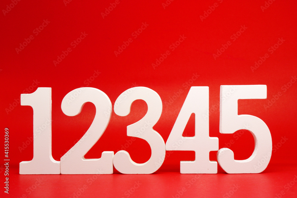 Counting numbers ( 1 2 3 4 5 ) white number wooden on Red Background ...