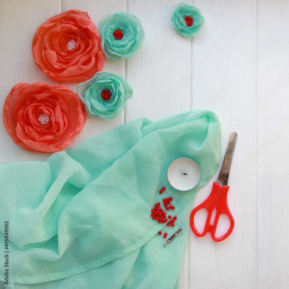 How to make a flower brooch from organza. Step 1. Take an organza cut ...