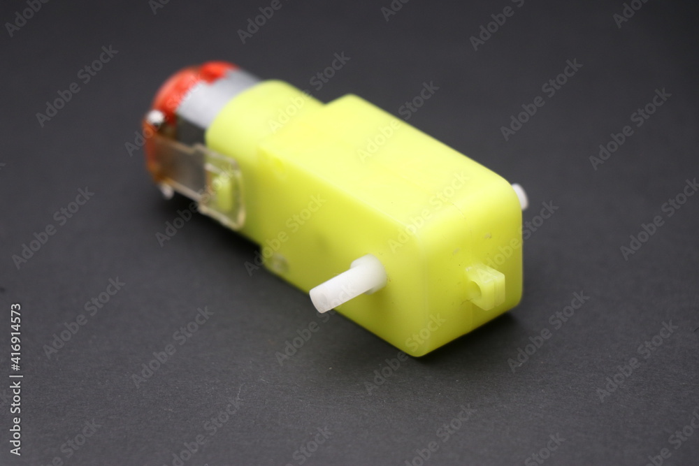 BO Motor also called as dual shaft geared motor on black background ...