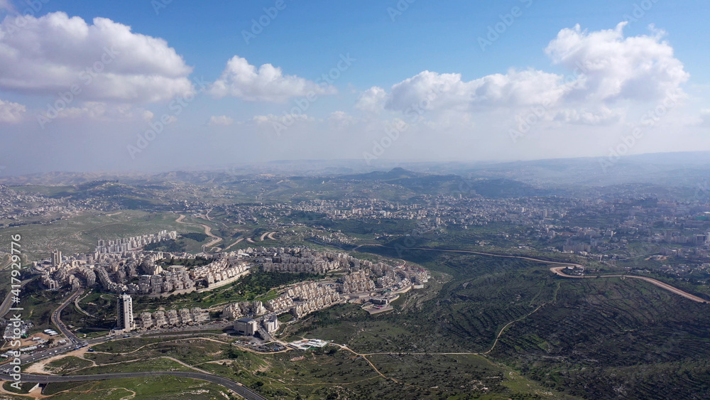 Jerusalem and Betlehem city wide aerial flight view Drone high altitude ...