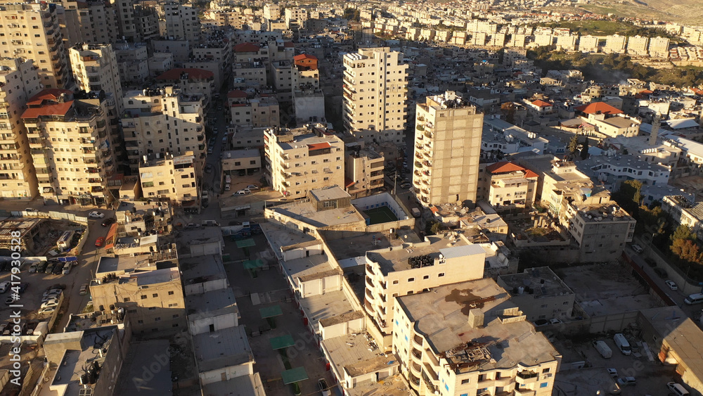 Anata Refugees Camp with security wall and idf watch tower- aerial view ...