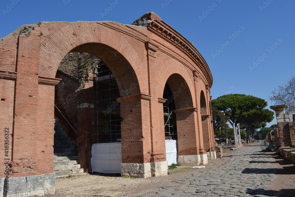 Red brick Arches of ancient amphitheater from outside at the ...