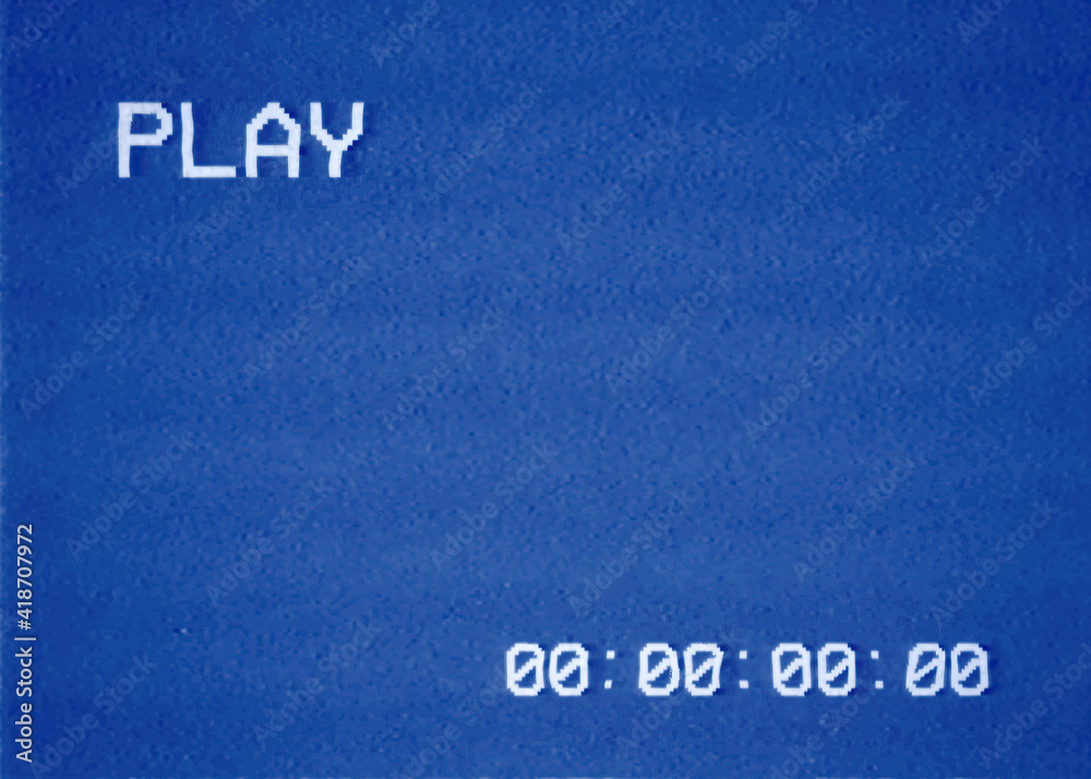 An old bad VHS tape playing. Blue screen with PLAY text and timecode. A ...