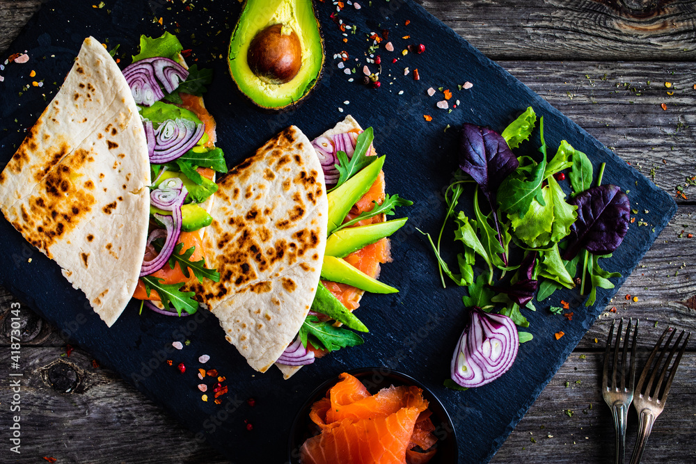 Italian piada wraps - piada stuffed with smoked salmon, avocado ...