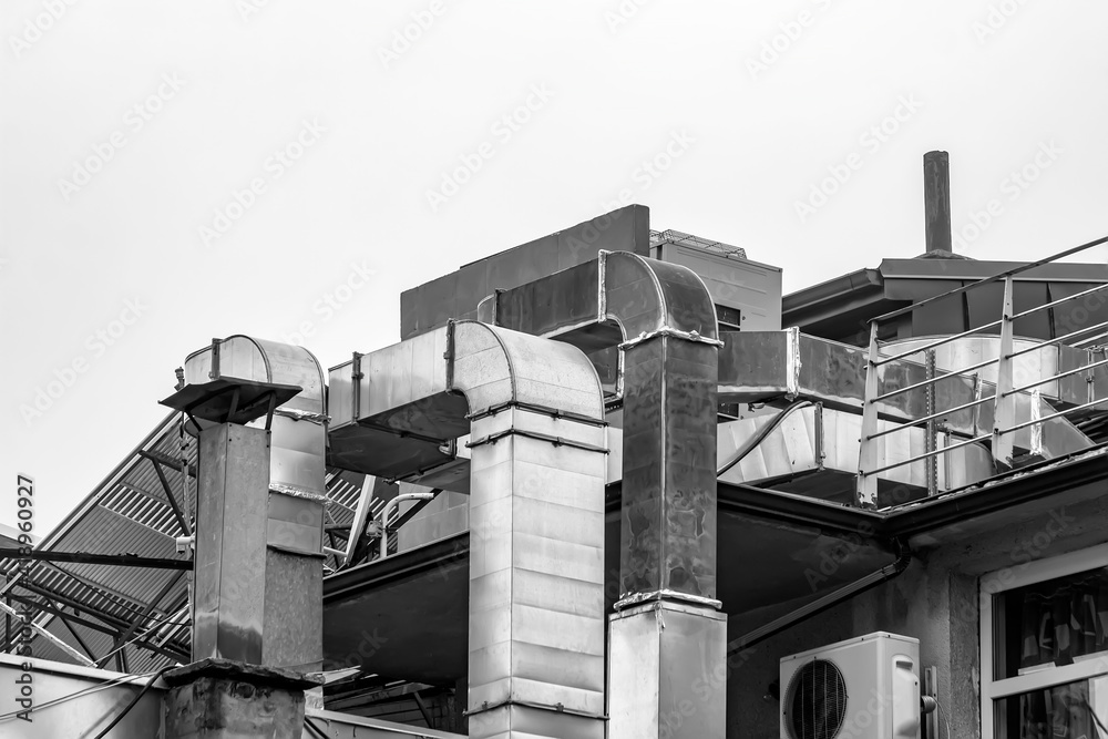 air ventilation flow system on the roof of the building. vent pipe fan ...
