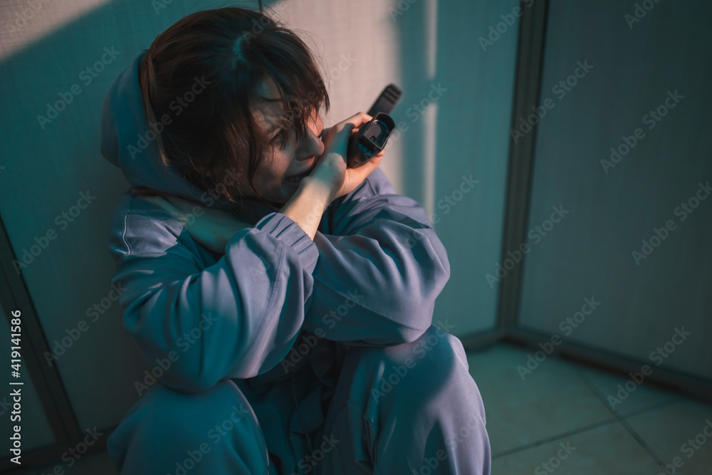 Woman holding a gun crying after committing murder Stock Photo | Adobe ...