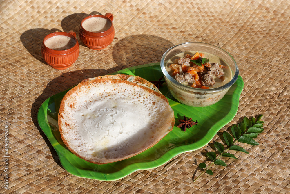 Appam, Hoppers and mutton stew Kerala breakfast food and Indian milk ...