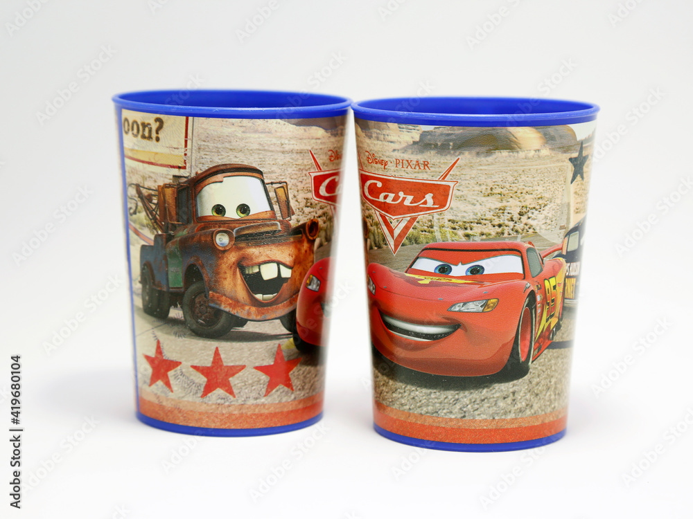 Glasses with the characters from the movie Cars. Glass with copy space ...