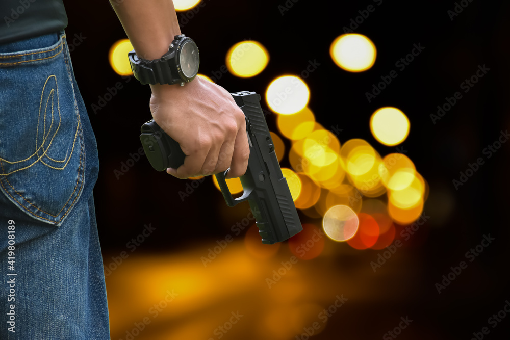 Automatic shotgun holding in hands ready to shoot, concept for security ...