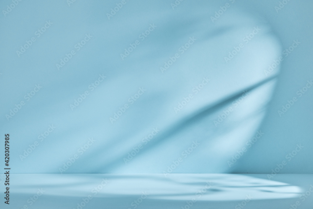 Abstract blue background with drop shadow and light. Backdrop for ...