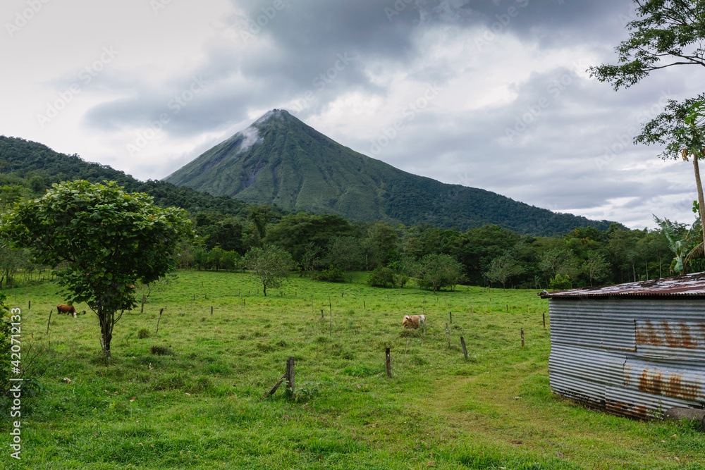 Arenal Volcano with farm Landscape in Costa Rica Stock Photo | Adobe Stock