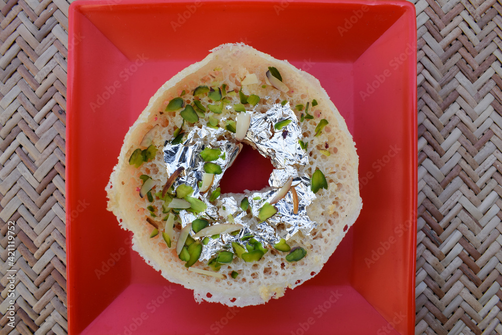 Traditional and authentic halwai style Indian sweet dish called Ghevar ...