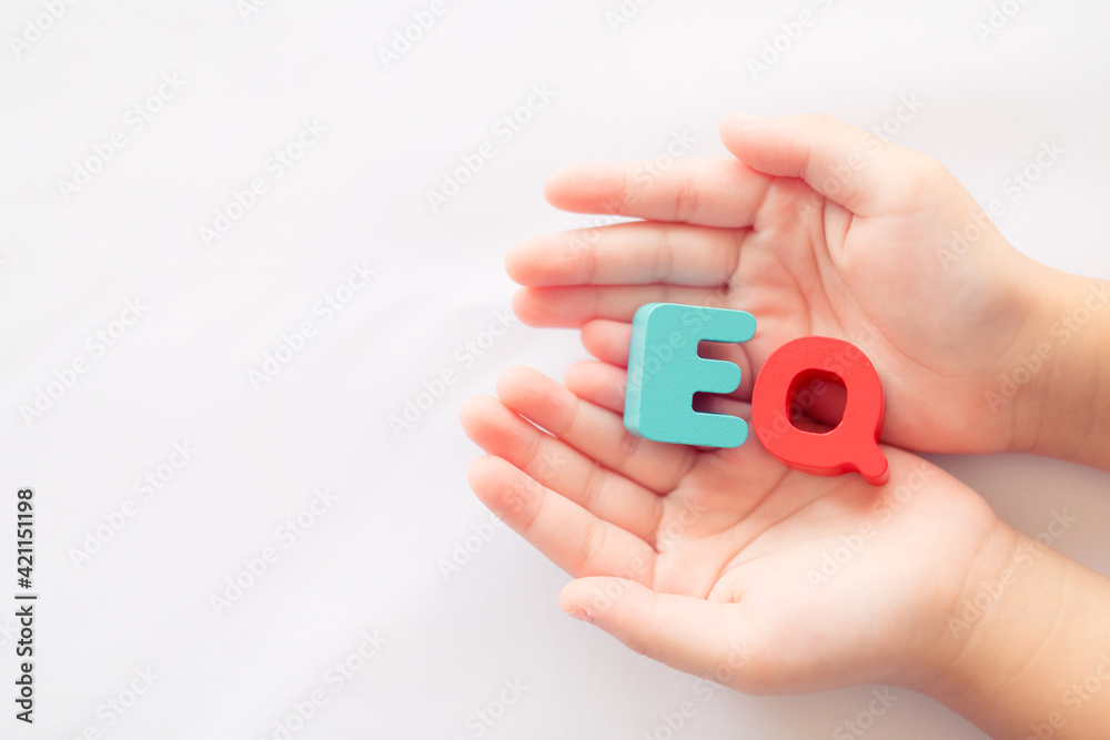 kid hand showing EQ on white banner background.Child development.EQ ...