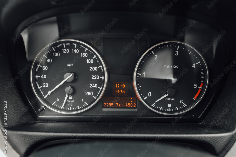 Passenger car speedometer with moving indicators. Dashboard with medium ...