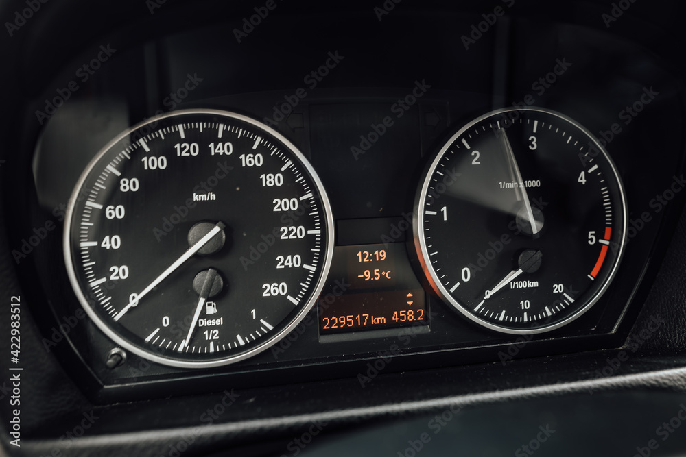 Passenger car speedometer with moving indicators. Dashboard with medium ...